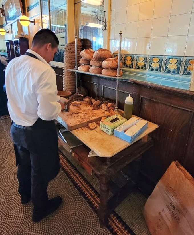 Fresh bread being prepared &ndash; because at Parc, even the simplest pleasures receive extraordinary attention.
