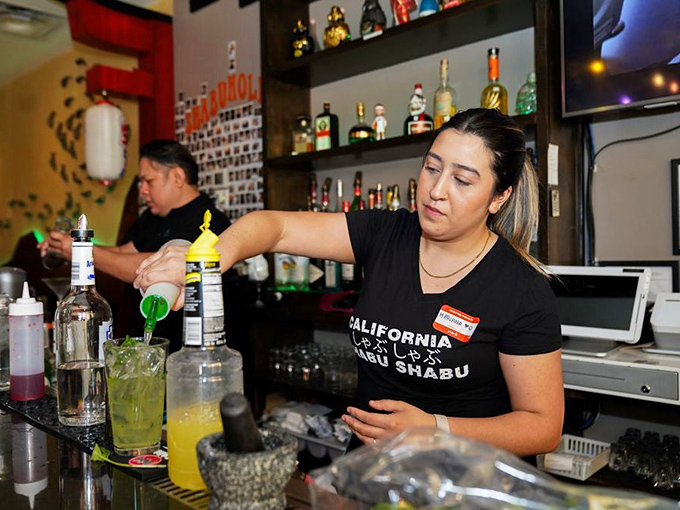 Mixology in action—crafting drinks with the same precision and care that goes into the food. Liquid artistry to complement your meal.