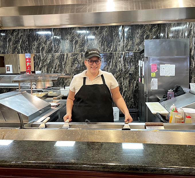 Behind every great buffet is a team that takes pride in their work &ndash; that smile says everything about the hospitality you'll experience.