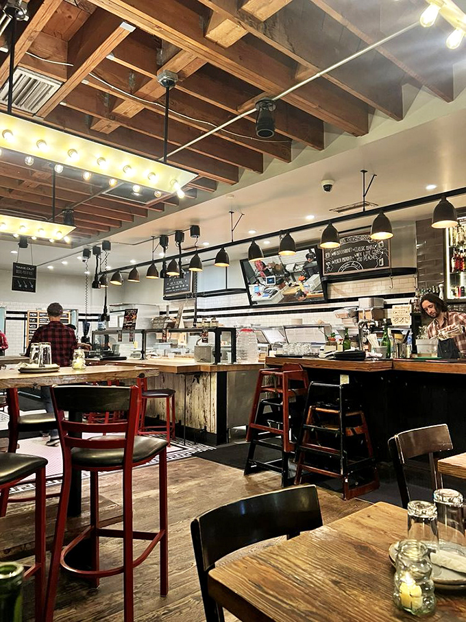 Where the magic happens &ndash; a glimpse into the open kitchen where smoke whisperers transform raw ingredients into barbecue masterpieces.