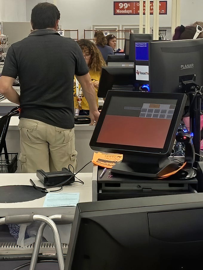 The final frontier: checkout counters where treasures are tallied and the thrill of the bargain is quantified in dollars saved.