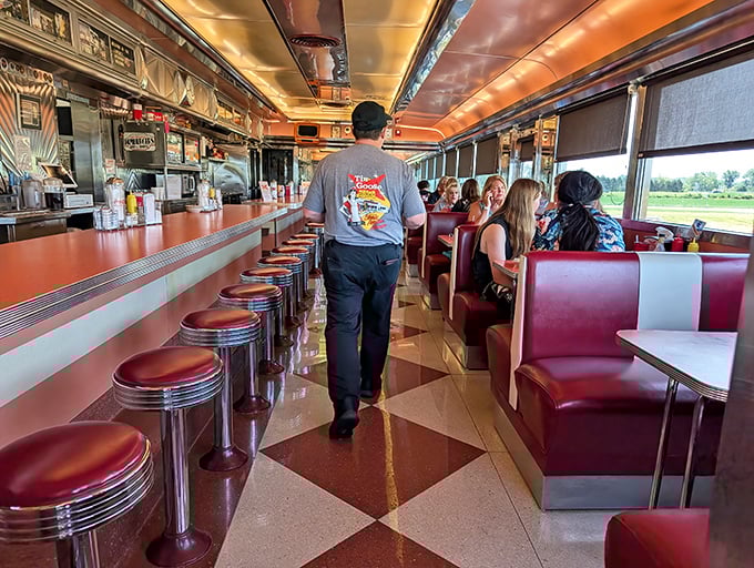 Servers navigate the classic diner layout with practiced ease, delivering plates of comfort food that make the journey to Port Clinton worthwhile.