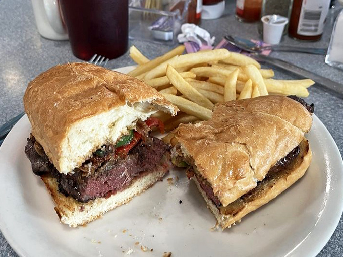 This steak sandwich isn't just lunch&mdash;it's a masterpiece of meat, bread, and determination. The kind of meal that requires both napkins and a nap afterward.