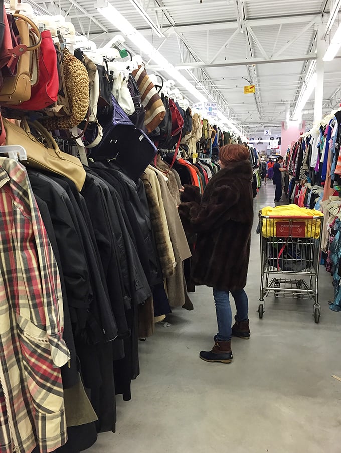 The serious business of coat hunting. That shopper knows winter is coming, and vintage fur waits for no one.