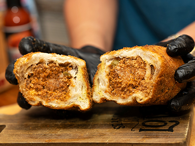 This meat-filled pastry isn't just food; it's edible engineering that would make both grandmothers and architects proud.