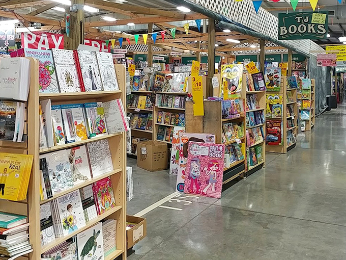 Books stack high at TJ's corner, because nothing beats the smell of old paperbacks and possibility.