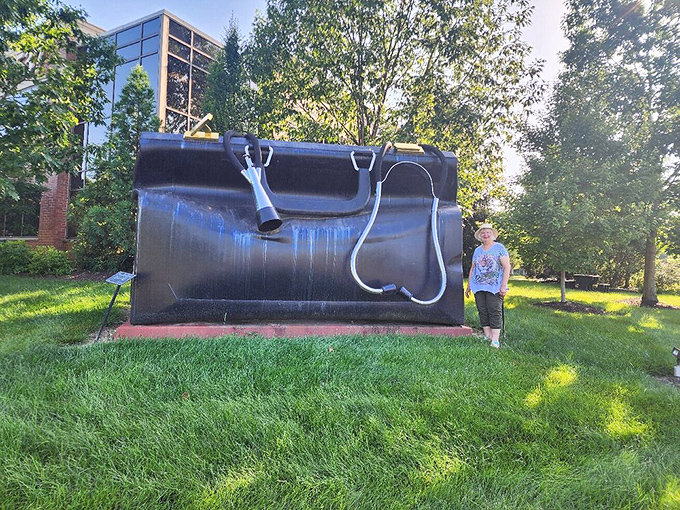 Every visitor develops their own signature pose with the bag. This one says, "I'm not a doctor, but I play one next to giant props."
