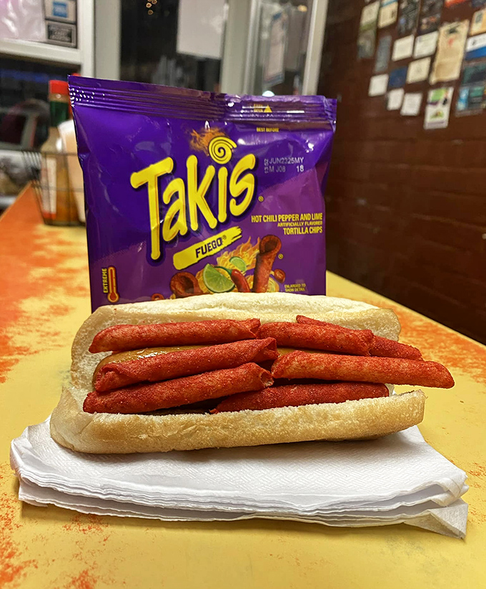 The Takis dog&mdash;where spicy rolled tortilla chips meet frankfurter. A modern twist that somehow feels right at home in this decades-old establishment.