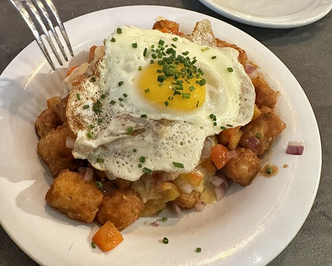 Taterquiles combining breakfast comfort with barbecue genius - whoever invented this deserves a medal and hug.