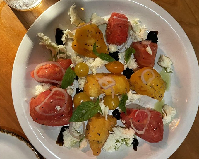 Heirloom tomato salad that tastes like summer decided to show off. The kind of dish that makes you forgive tomatoes for being bland the rest of the year.