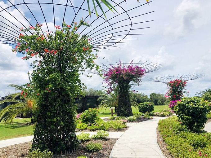 These flowering trellises reach skyward like botanical skyscrapers, creating living architecture that changes with each season.