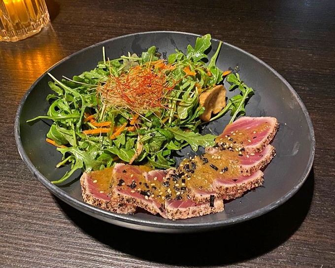 Sesame-crusted tuna that's perfectly pink in the middle, like nature's most delicious bullseye. That salad isn't just a garnish&mdash;it's a worthy companion.