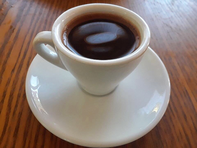 Turkish coffee served the traditional way&mdash;intense enough to make your regular morning brew seem like dishwater by comparison.