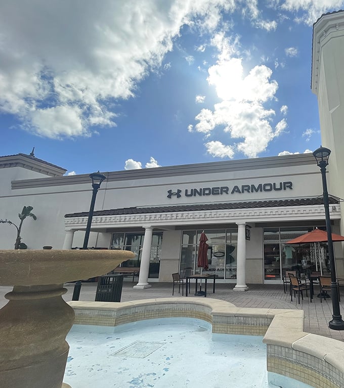 Under Armour standing guard over a serene fountain. Where performance meets price point in a setting that's surprisingly zen.