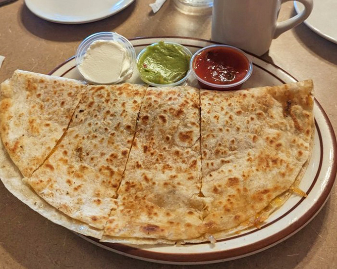 A quesadilla that's been hitting the gym&mdash;packed with fillings and served with the holy trinity of dips.