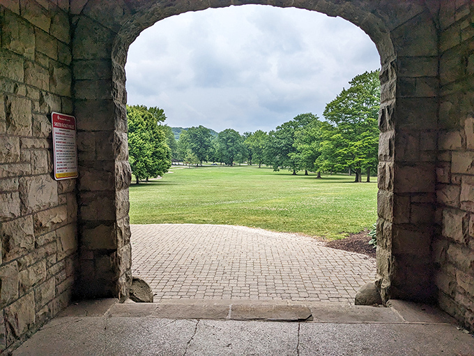 A stone portal frames the verdant grounds beyond, inviting visitors to step from medieval fantasy into the natural splendor of Ohio's parkland.