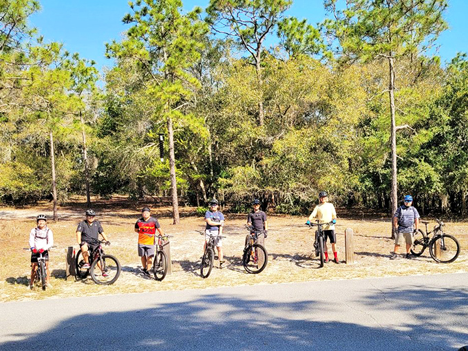Biking enthusiasts gather before tackling the park's trails. Those smiles suggest they know something about the adventures ahead that you don't&mdash;yet.