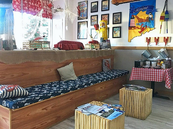 The waiting area doubles as a mini Maine museum. Those nautical-themed cushions are almost as comfortable as knowing lobster is in your future.