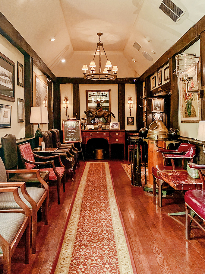 The waiting area feels less like a restaurant lobby and more like the study of that wealthy uncle you wish you had.