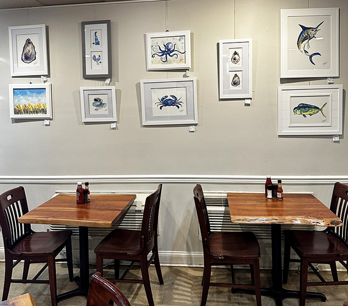 Local artwork featuring coastal themes adorns the walls, giving diners something to contemplate between bites of perfectly scrambled eggs.
