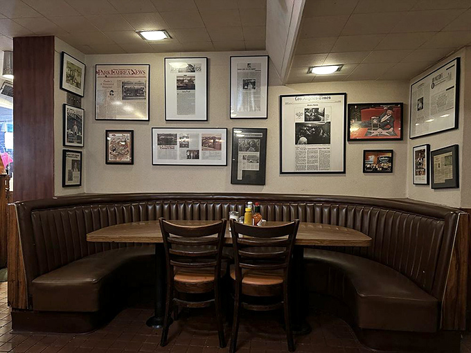 The booth where a thousand deals were made and a million stories were shared. These walls have heard more secrets than most therapists.