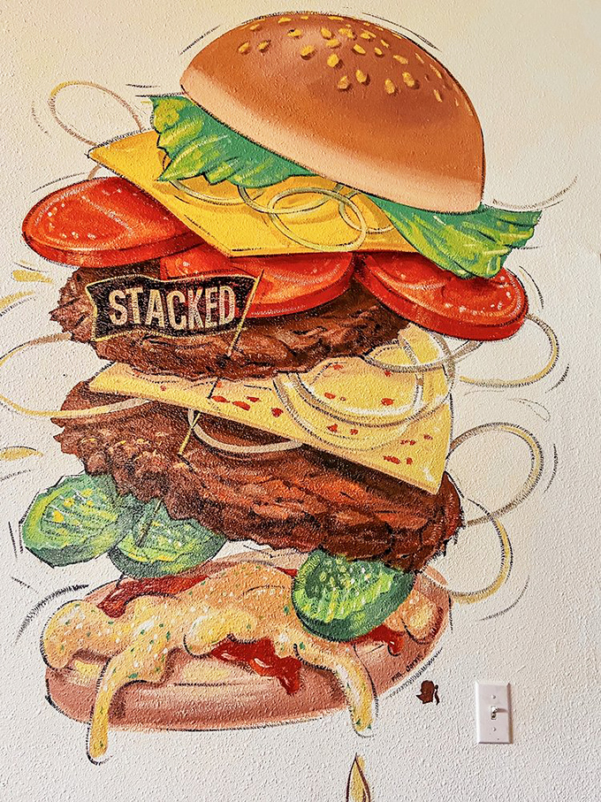 Wall art that speaks to your soul&mdash;a towering burger masterpiece that's both inspiration and challenge.