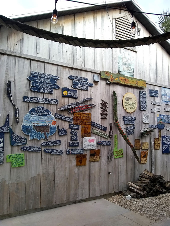 A wall of wooden wisdom and coastal quips that tells you this place doesn't take itself too seriously&mdash;just its seafood.