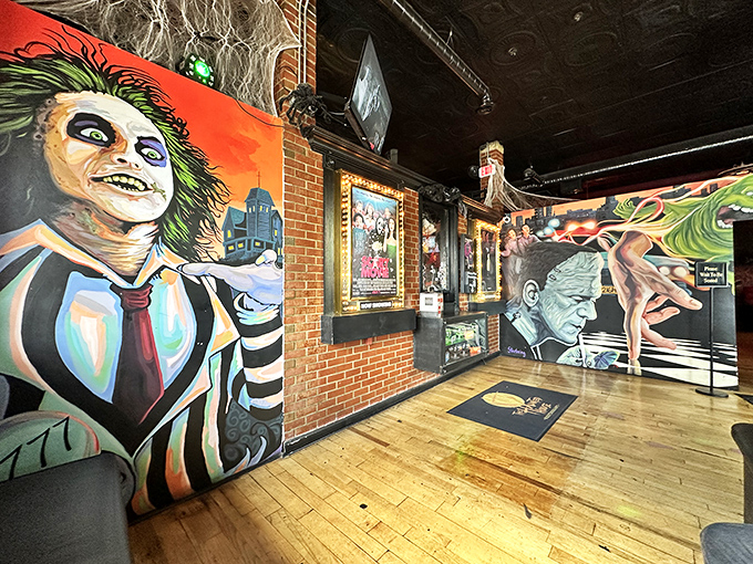 Beetlejuice grins from the wall while you decide between burgers and those famous Chucky Rolls.