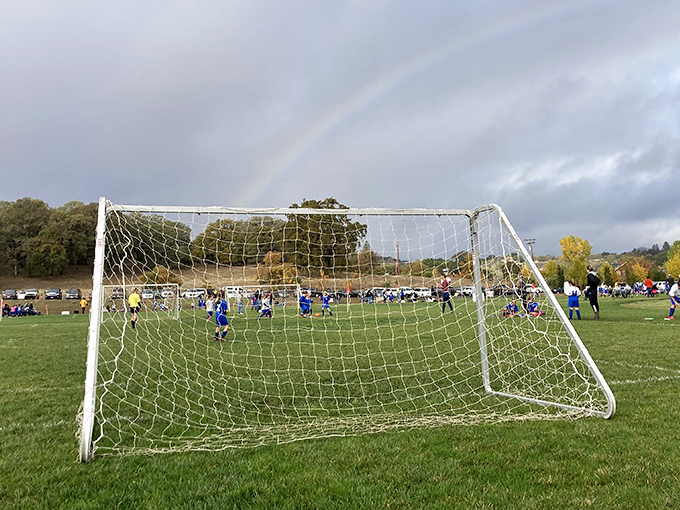 Soccer under rainbows at Westside Community Park&mdash;where kids play the beautiful game while nature provides the spectacular backdrop for free.