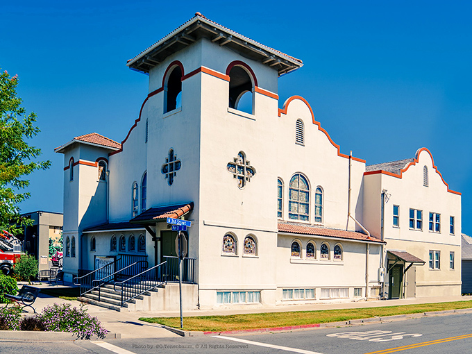 This Spanish-inspired church architecture brings a touch of mission-era California to Rio Vista, standing dignified against that perfect blue sky.