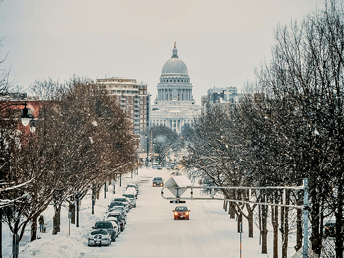 This snowy scene might not be Madison, but it reminds us that even the most picturesque towns occasionally need a seasonal costume change.