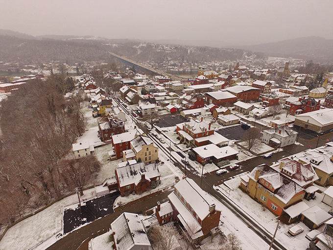 Winter transforms Brownsville into a Norman Rockwell painting, where snow-dusted rooftops create a quieter, more contemplative version of town.