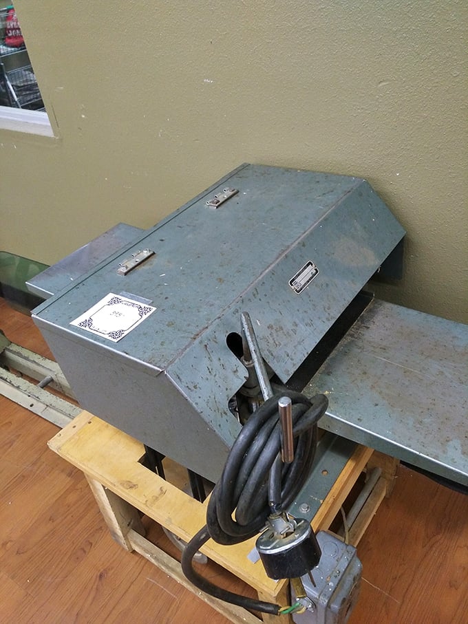 Industrial equipment with the patina of honest work. This machine has shaped more wood than a beaver colony on overtime.