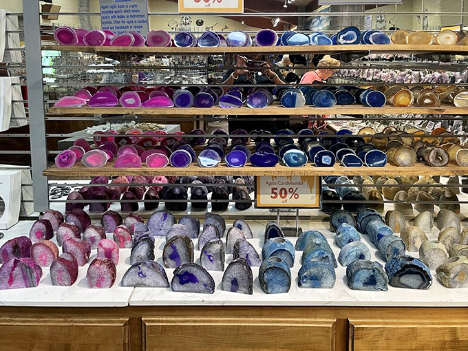 A rainbow of earth's treasures on display. These polished geodes prove that sometimes the most beautiful things require being cracked open first.