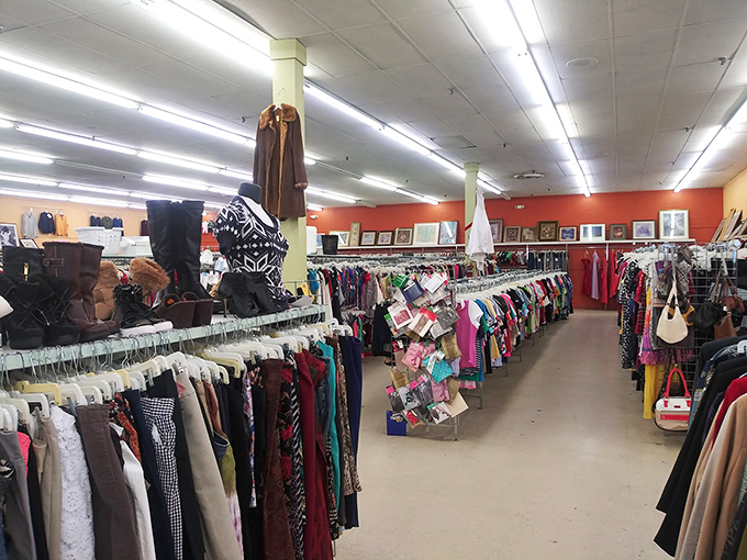 The women's clothing section offers a fashion time capsule where vintage treasures hide among everyday basics, all waiting for their second act.