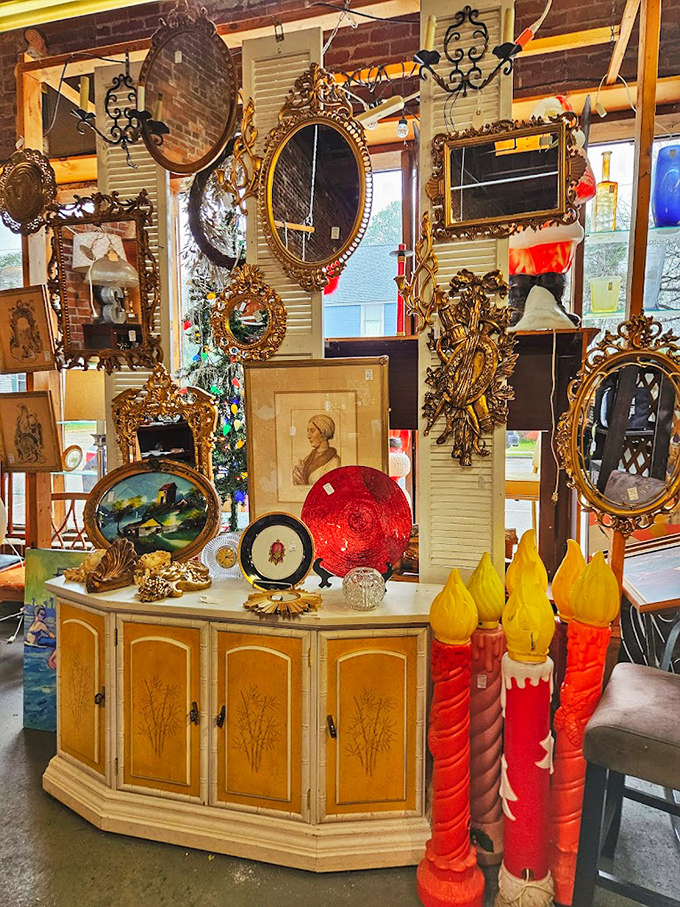 A wall of ornate mirrors where you can literally see yourself surrounded by different decades. That gold-framed one probably hung in a mansion.