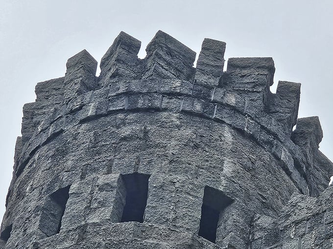 The crenellated tower top looks ready to repel invaders, though in Florida the only sieges involve tourists armed with selfie sticks.