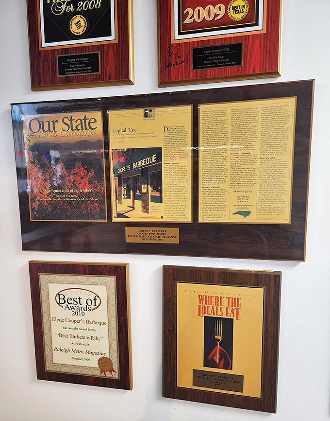 Awards that tell the story of barbecue excellence. When your walls look like this, you're not just cooking&mdash;you're making history. 