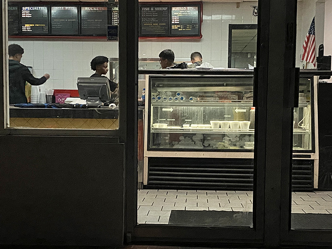 A glimpse into the evening operation—where the real magic happens as locals know this is when the freshest batches emerge from the fryers.