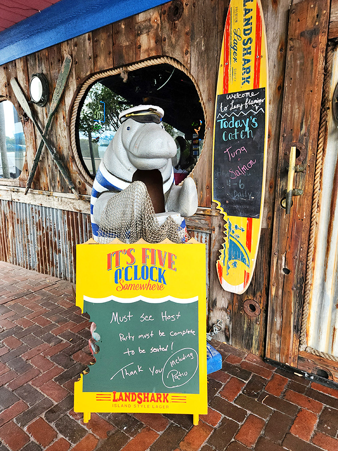 "It's Five O'Clock Somewhere" isn't just a saying here&mdash;it's a lifestyle philosophy endorsed by this nautical manatee greeter.