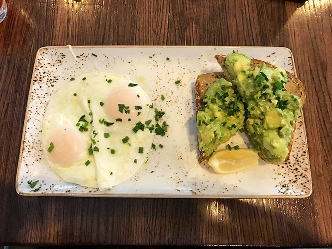 Avocado toast and eggs &ndash; the breakfast power couple that makes you feel virtuous and indulgent simultaneously. Chives add that perfect finishing touch.
