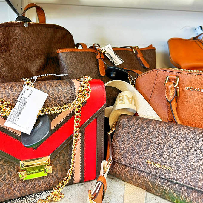 Designer handbags huddled together like gossips at a cocktail party. Michael Kors without the Michael Kors price tag.