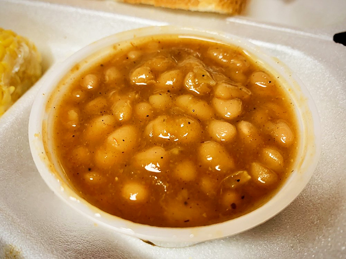 Baked beans simmered to that perfect sweet-savory intersection. The side dish that's secretly plotting to steal the show.