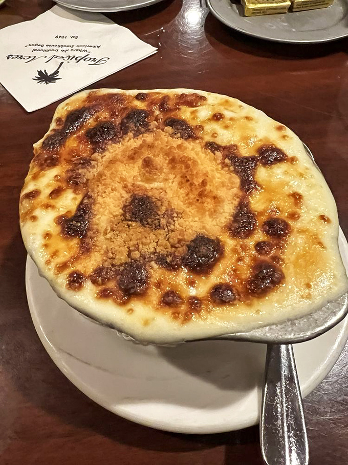 French onion soup that's achieved the perfect cheese-pull-to-broth ratio. A dish that's both comfort food and engineering marvel.