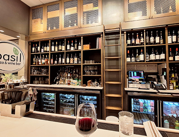 The bar's library ladder isn't just for show&mdash;it's for reaching those special bottles that make Tuesday feel like Saturday.