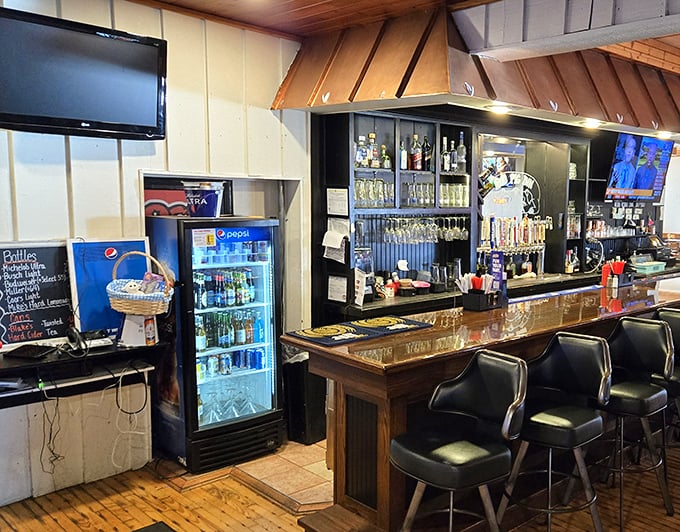 The bar area strikes that perfect balance between "come as you are" and "stay awhile." Those stools have supported countless elbows and heard innumerable local stories.