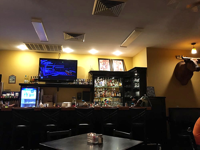 The bar area: where bourbon meets beef in a marriage blessed by the gods of comfort food.