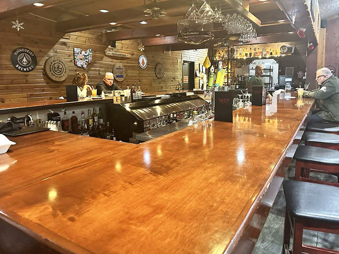 The bar where strangers become friends and friends become regulars. Wood-paneled perfection with just enough polish to be welcoming.