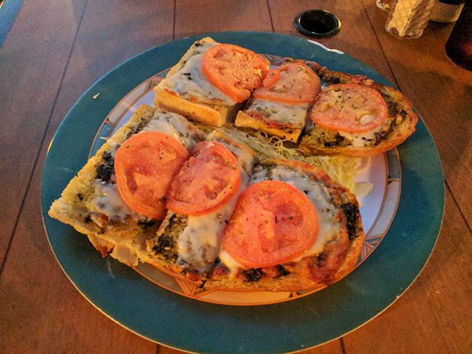 Flatbread with tomatoes so fresh, they're practically still gossiping about their neighbors in the garden.