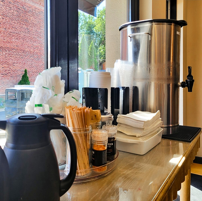 The coffee station stands ready for caffeination—because what are magnificent pastries without their perfect bitter companion?